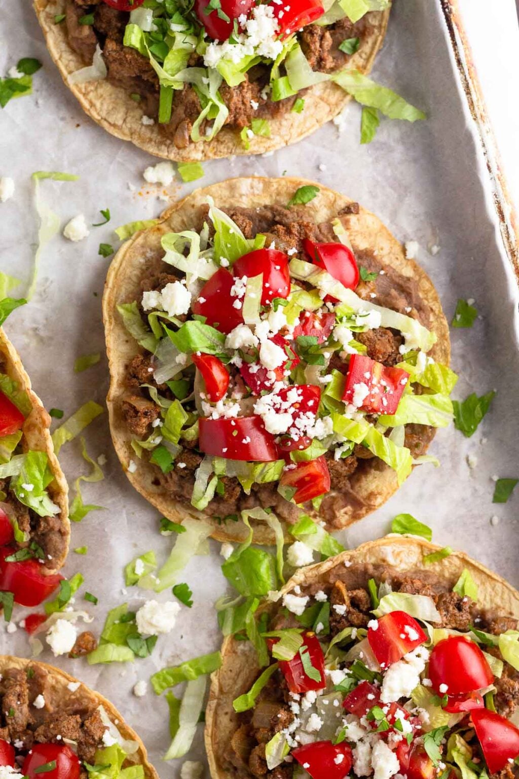 25-Minute Beef Tostadas with Beans & Cheese - Eat the Gains